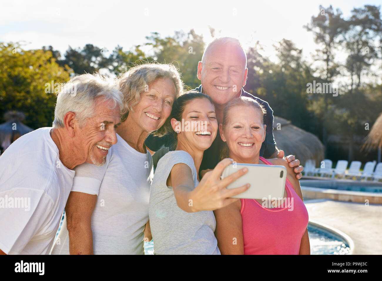 Happy seniors as a tour group take a selfie with the smartphone Stock ...