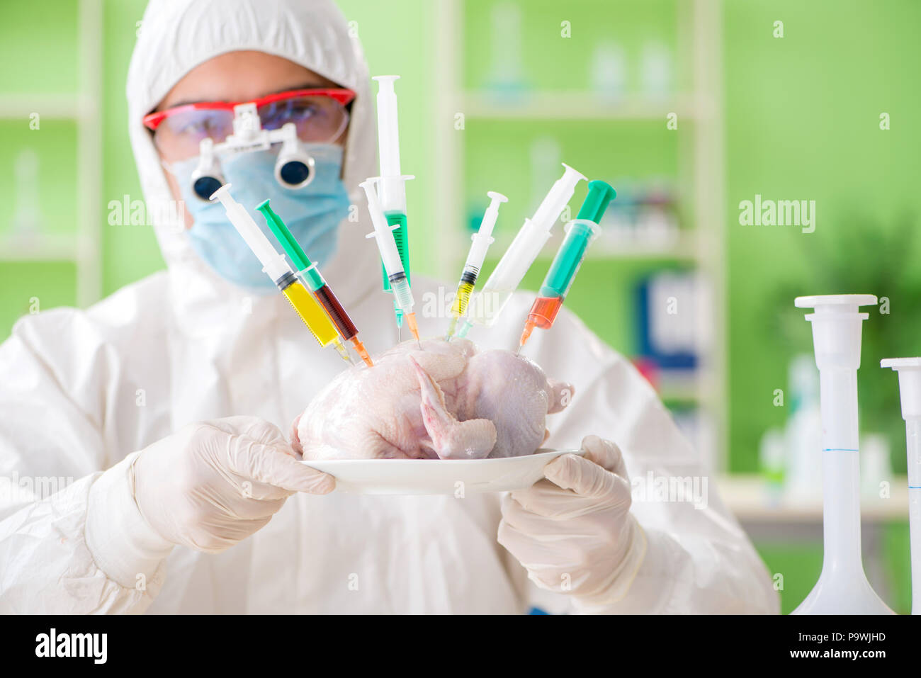 Lab assistant testing GMO chicken Stock Photo - Alamy