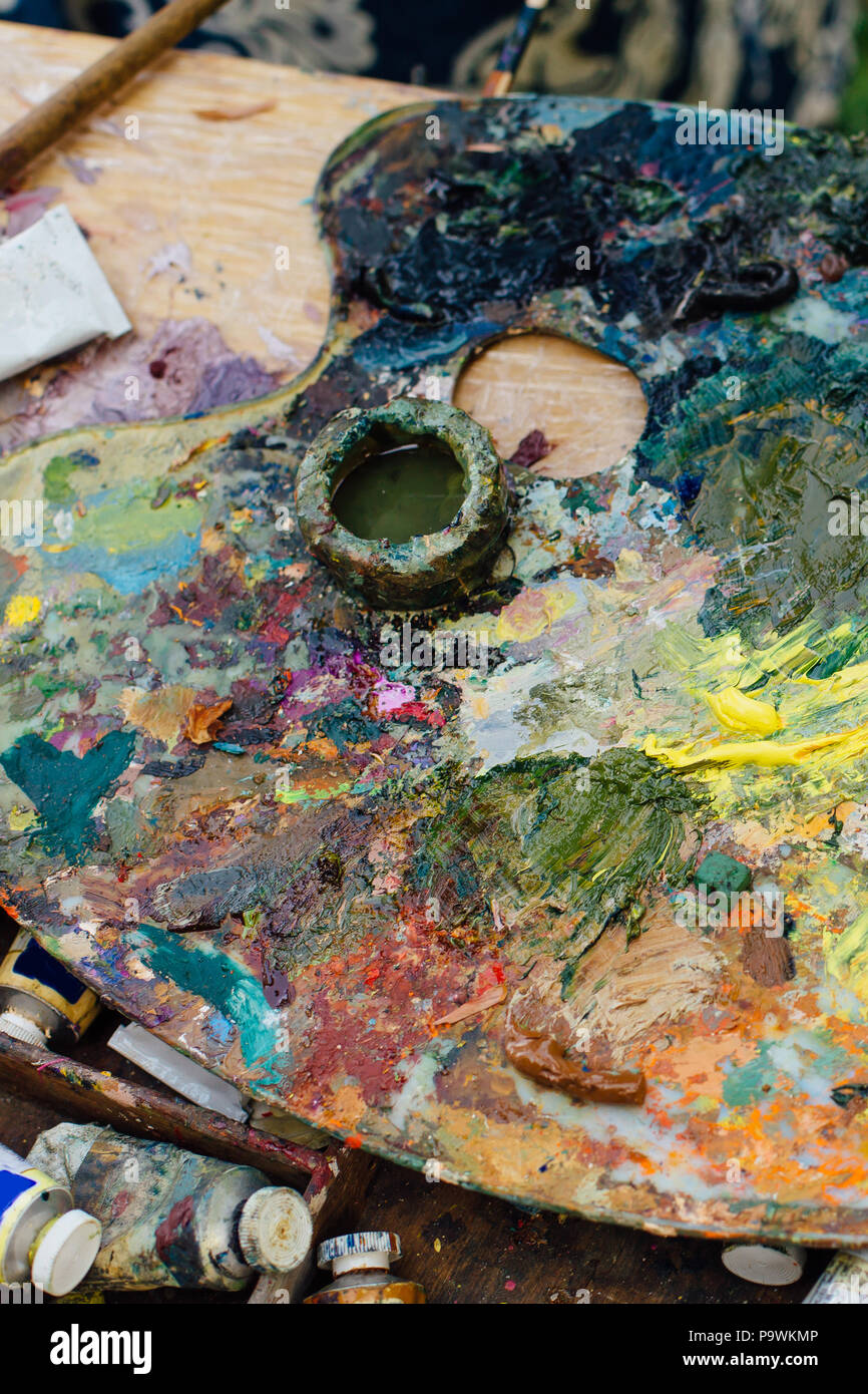 Palette with oil paints. Close up of different color oil paint Stock ...