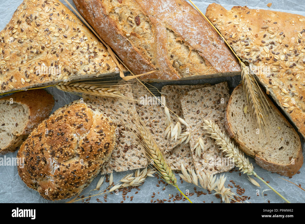 Assortment of baked goods on paper. Freshly of bakery products. View ...