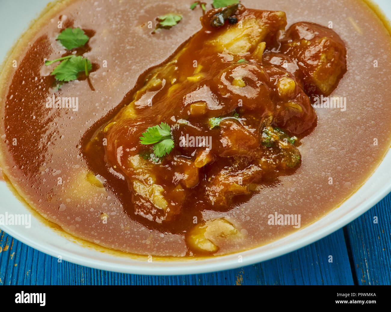 Bengali doi maach - Bengali Fish Curry with fresh cilantro Stock Photo ...