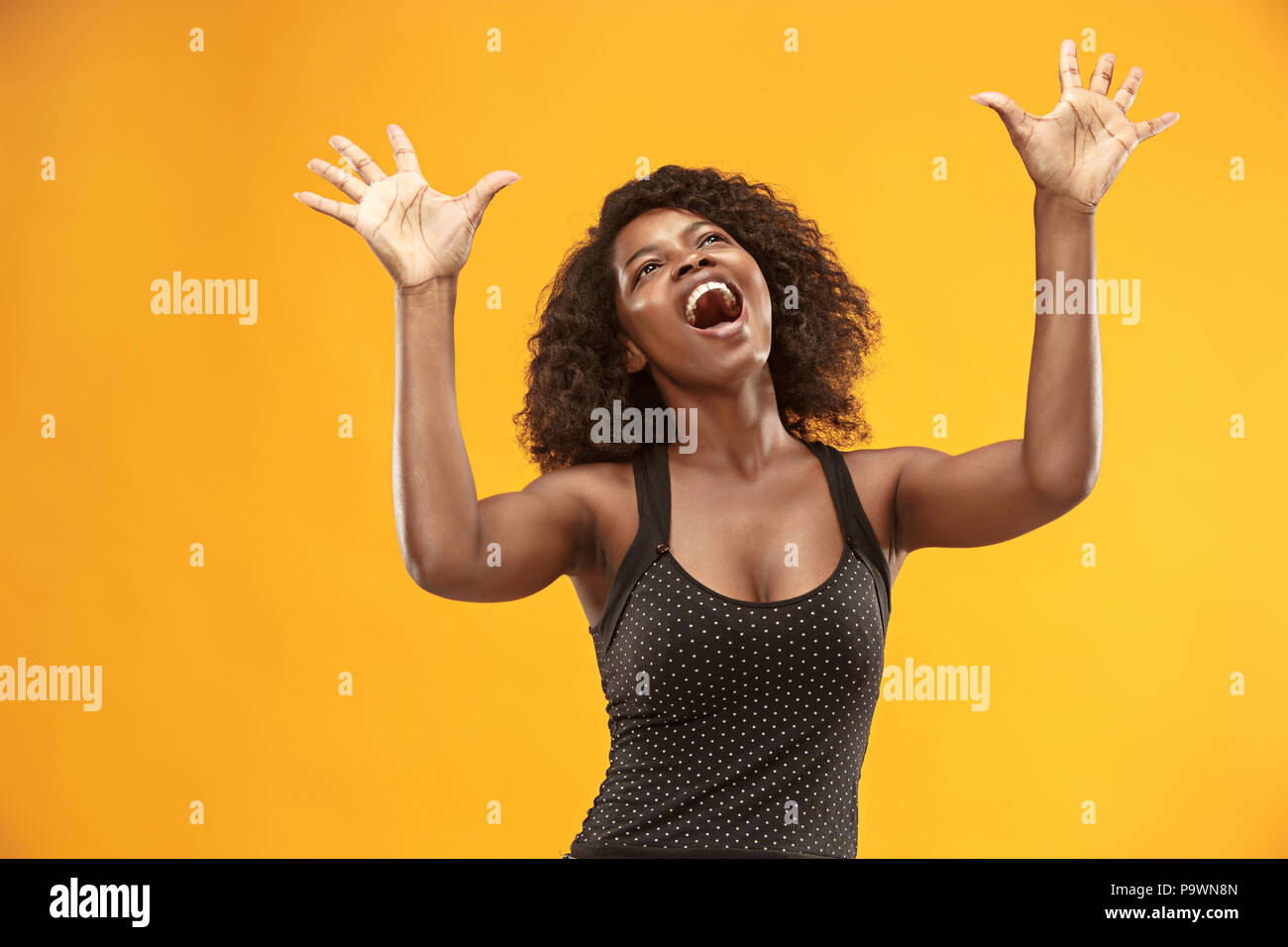 Winning success woman happy ecstatic celebrating being a winner. Dynamic energetic image of ...