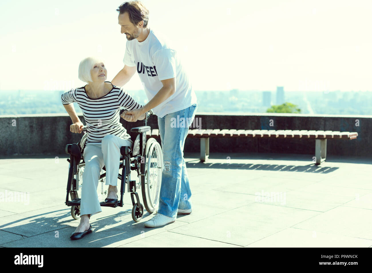 Confident social worker helping his client Stock Photo - Alamy