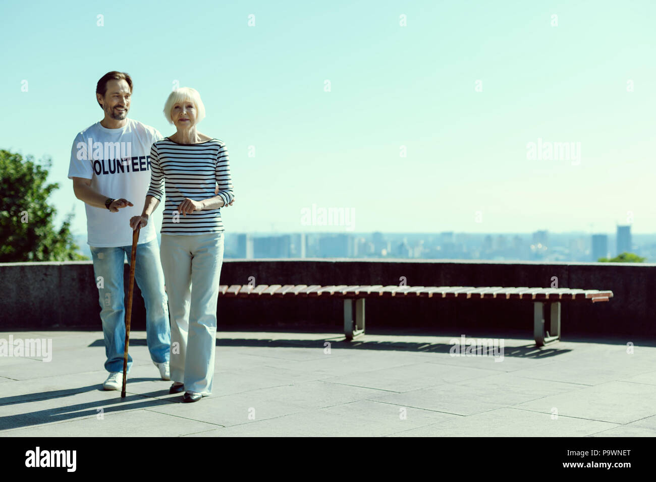 Elderly woman using walking stick hi-res stock photography and images ...