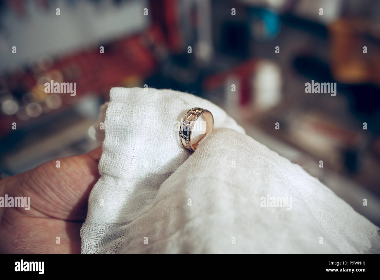 Different goldsmiths tools on the jewelry workplace. Jeweler at work in ...
