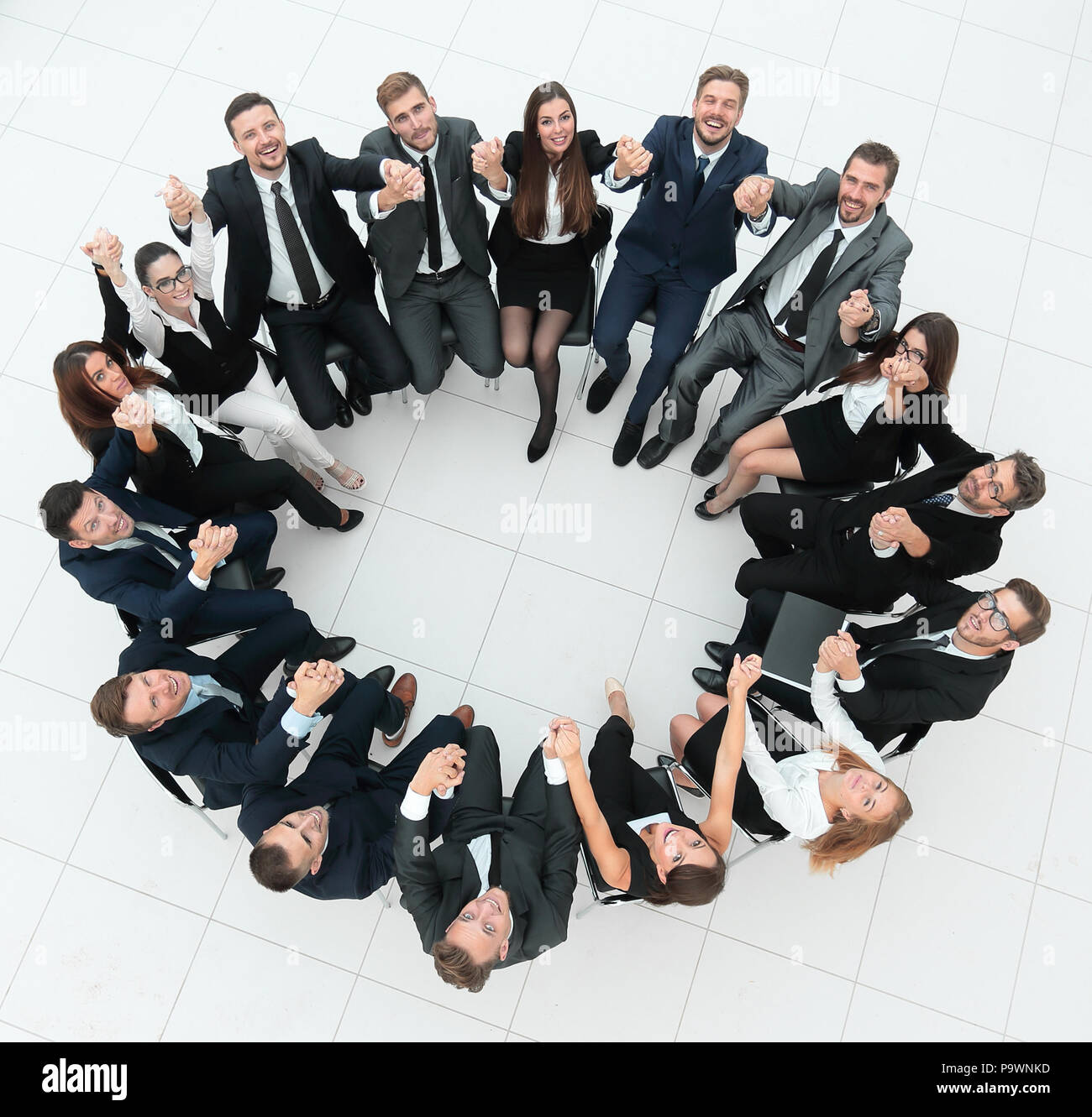 concept of team building.large business team sitting in a circle Stock ...