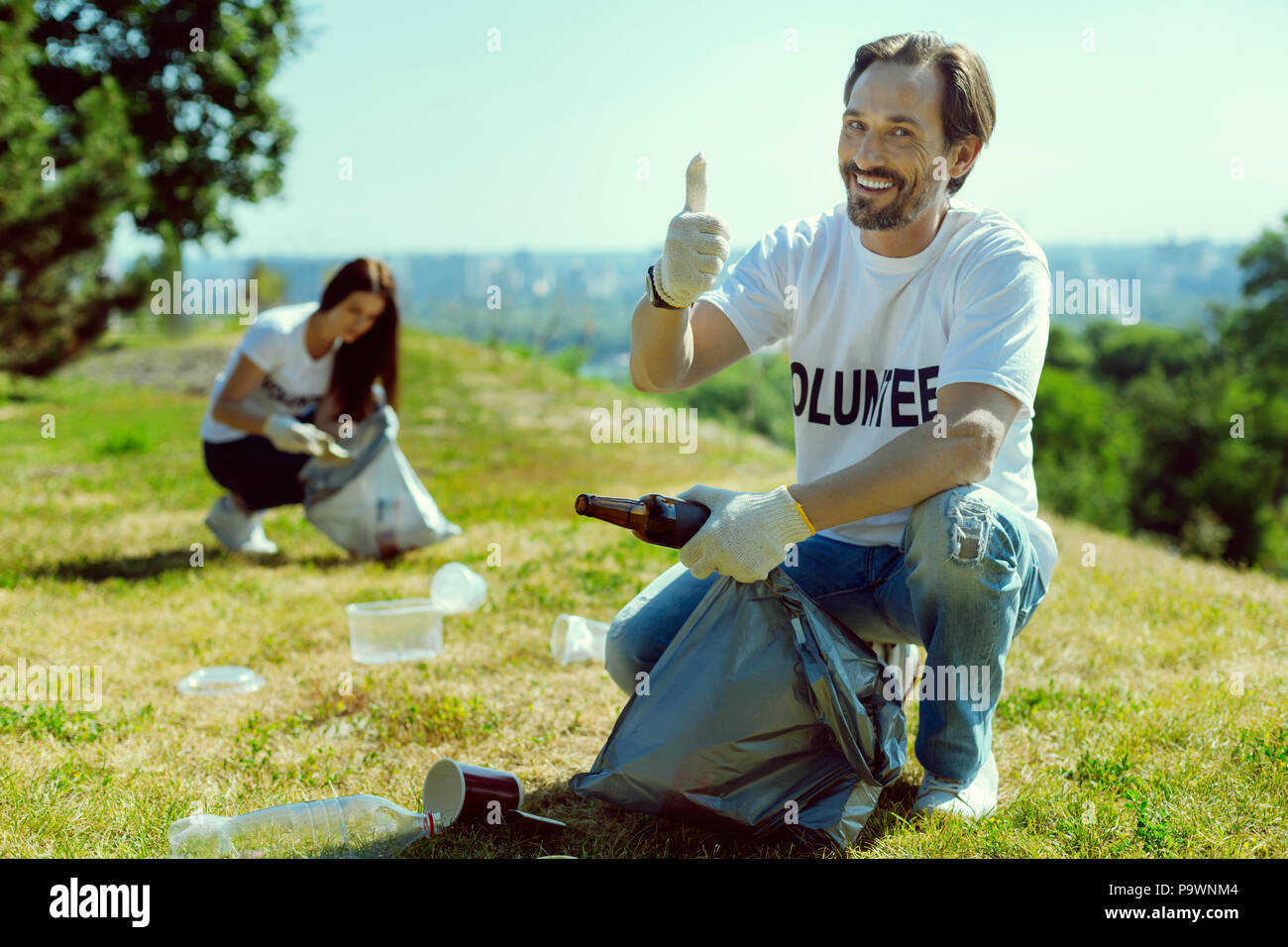 Man littering park hi-res stock photography and images - Alamy