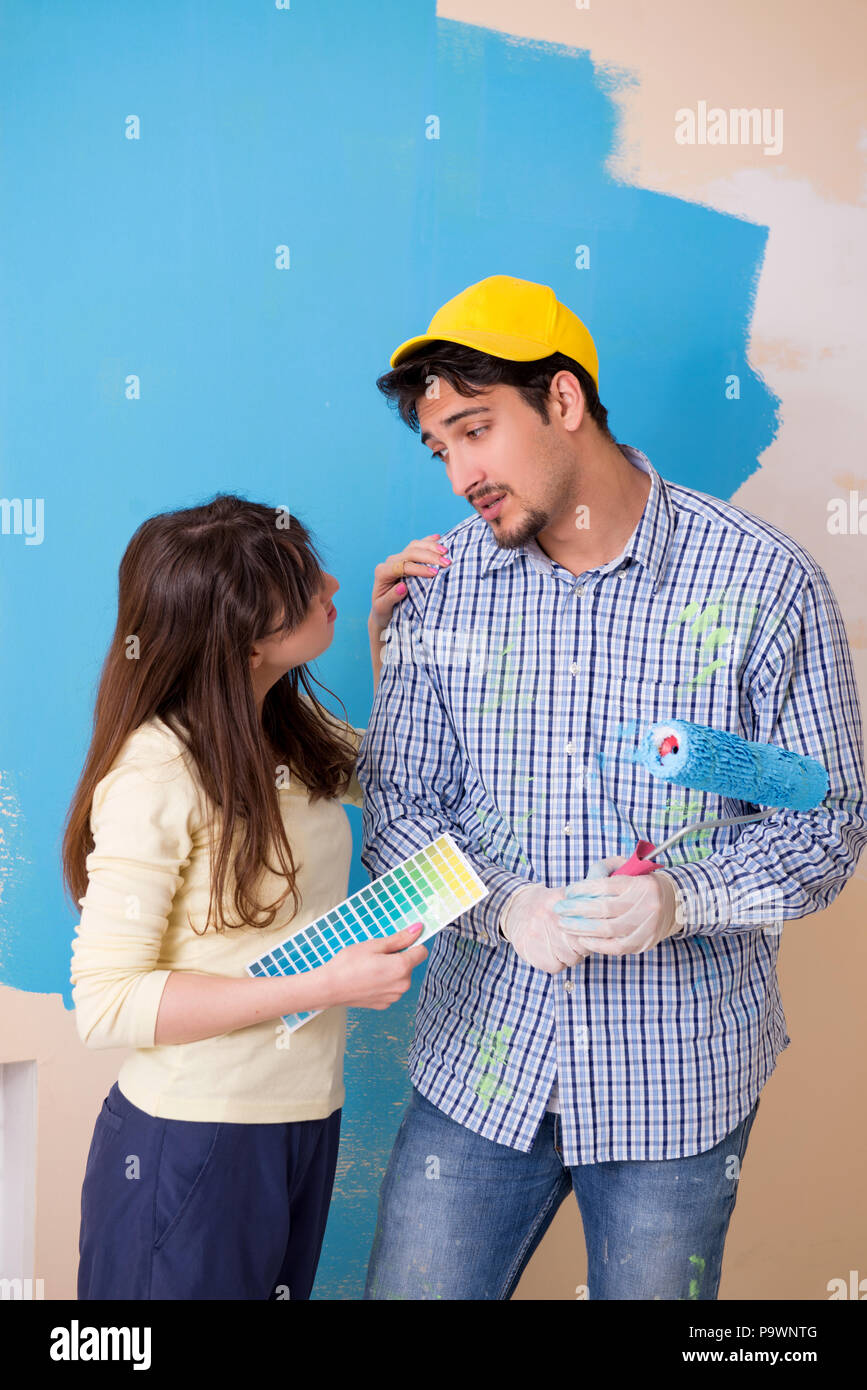 Husband and wife doing renovation at home Stock Photo - Alamy