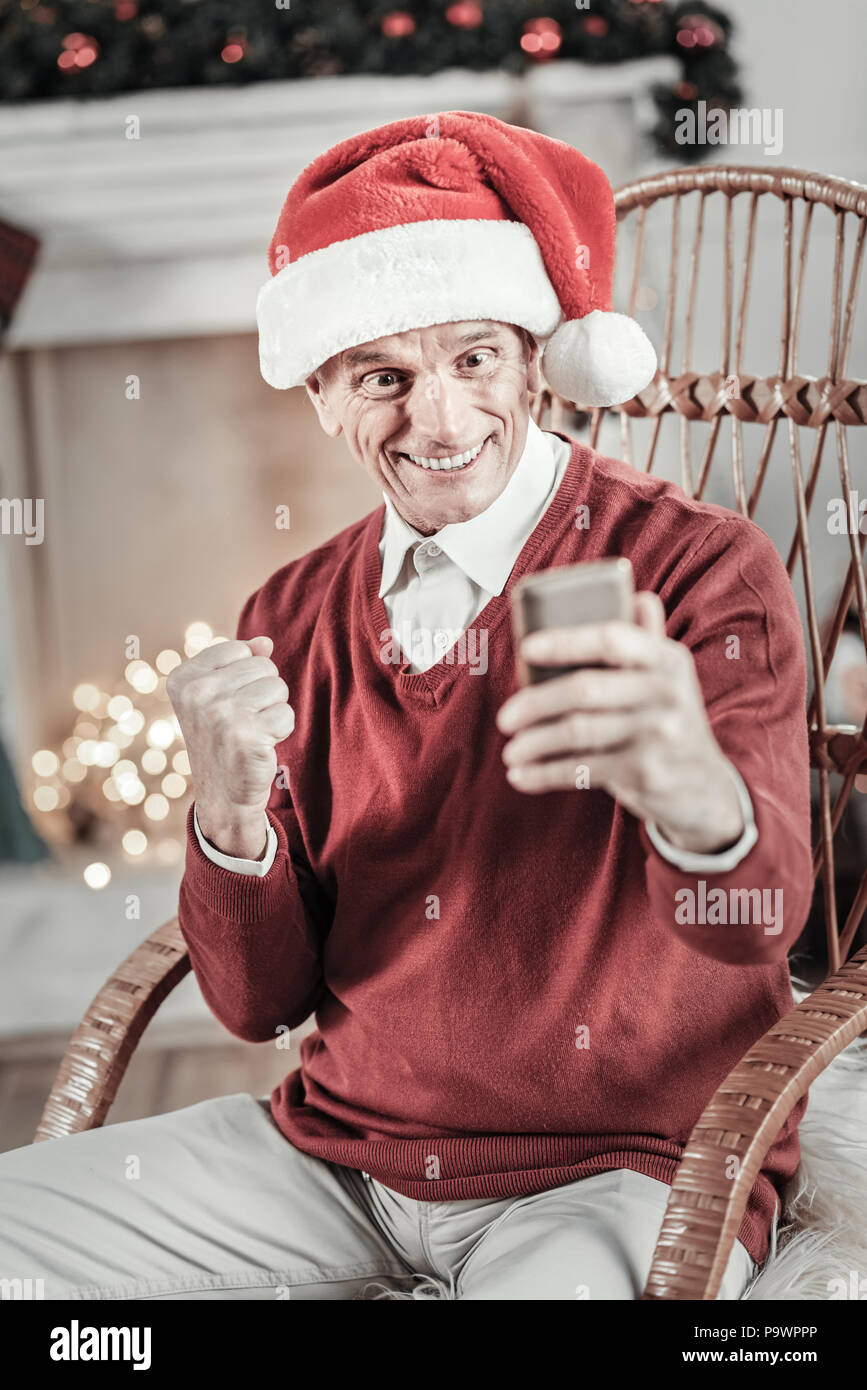 Cheerful old man being pleased Stock Photo - Alamy