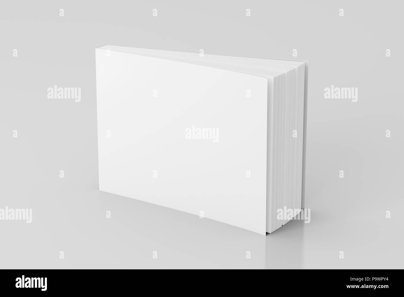 Blank white horizontal soft cover book standing on white background ...