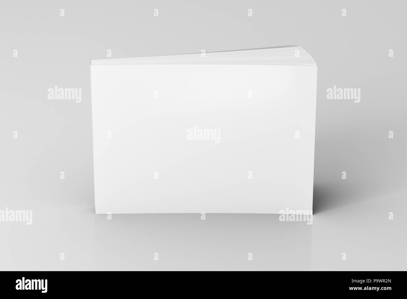 Blank white horizontal soft cover book standing on white background ...
