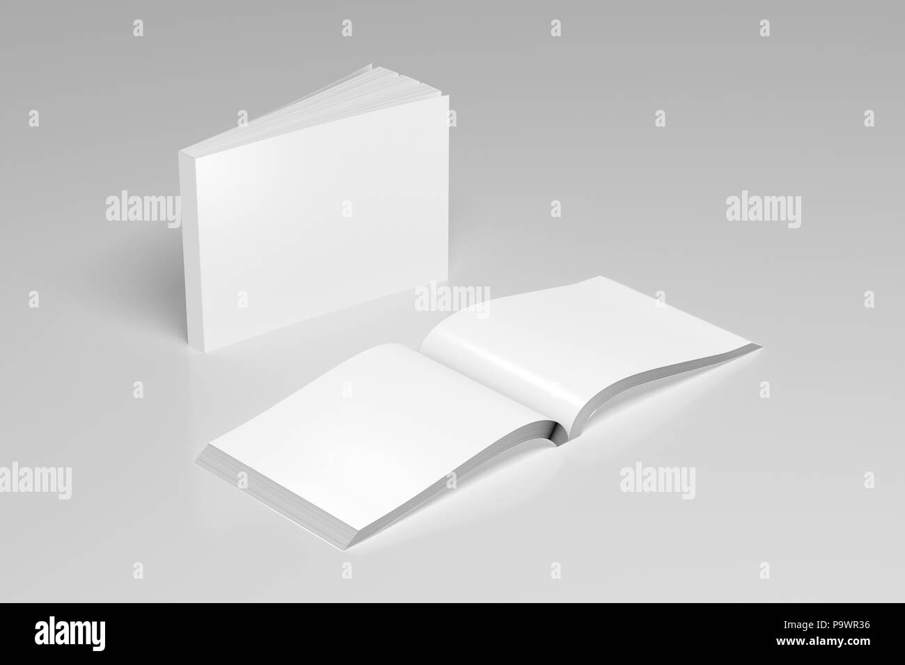 Blank white horizontal soft cover books open and standing on white ...