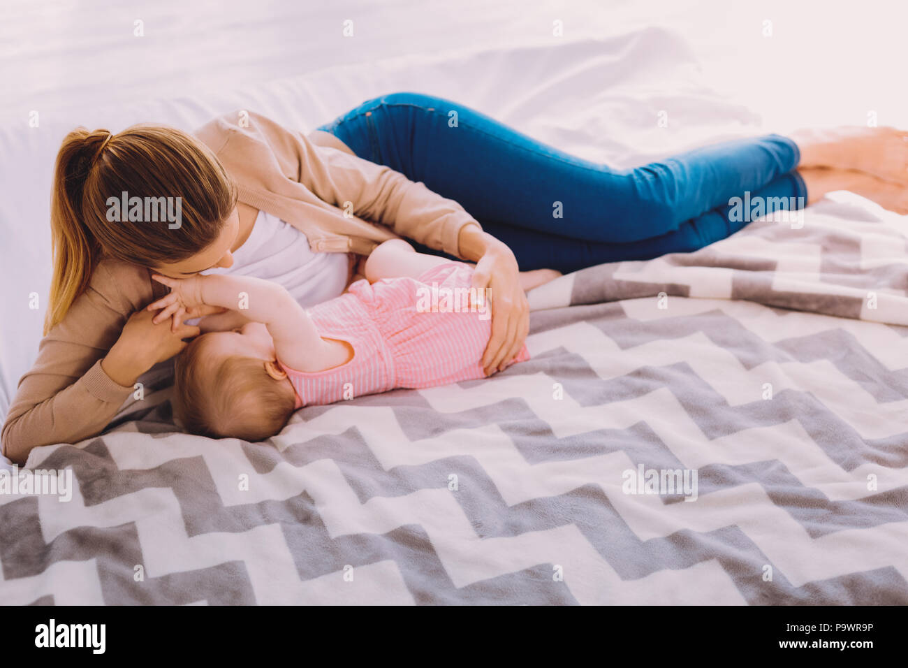 Natural process breastfeeding baby hi-res stock photography and images ...