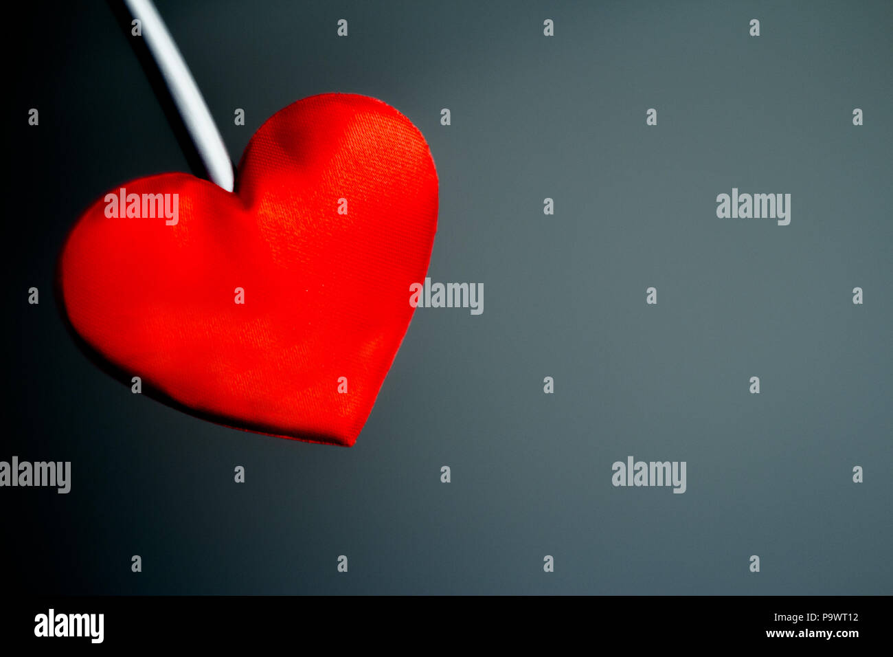Red heart on neutral background without people Stock Photo - Alamy