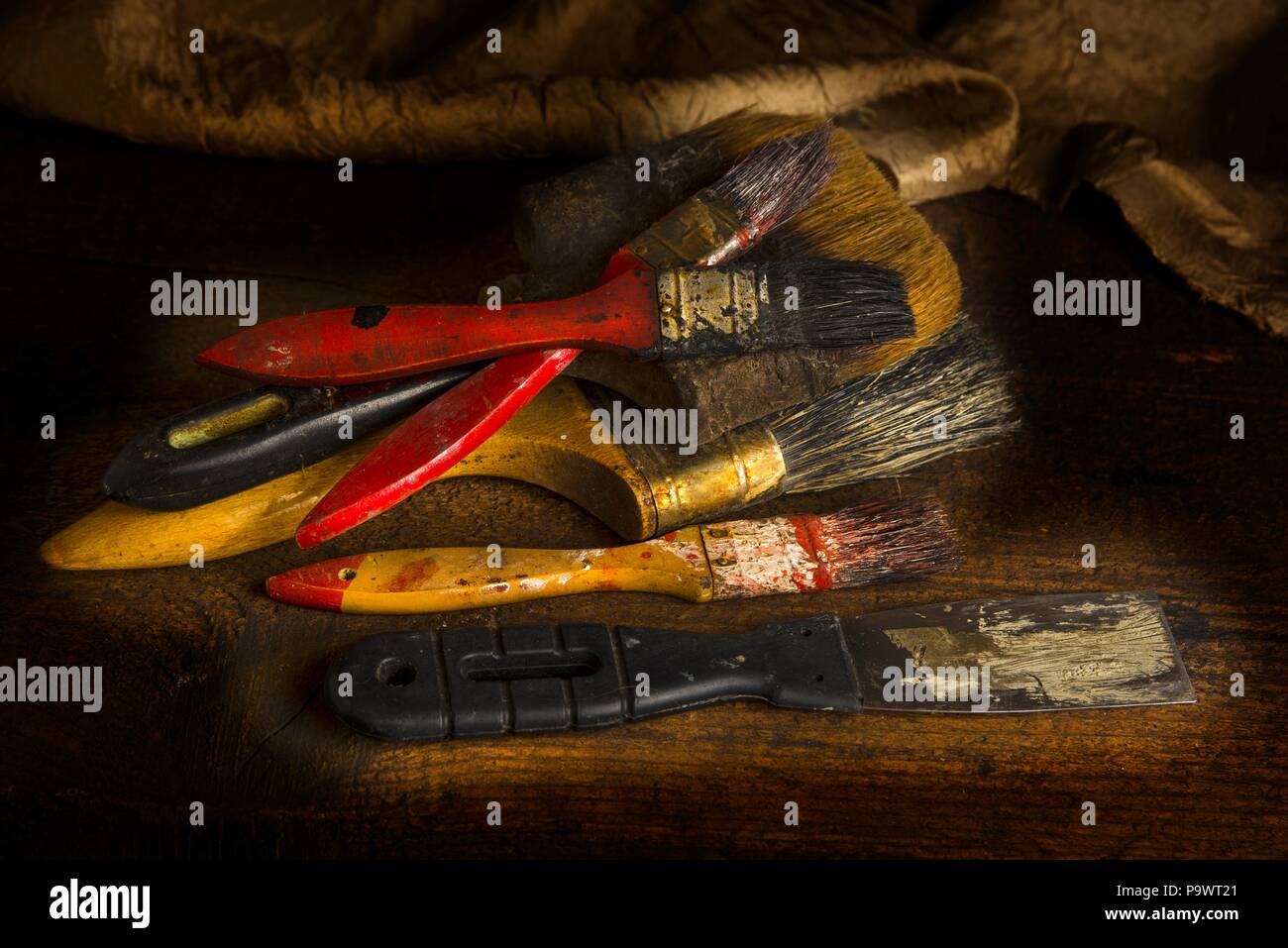 Old brushes on the table in the dark Stock Photo - Alamy