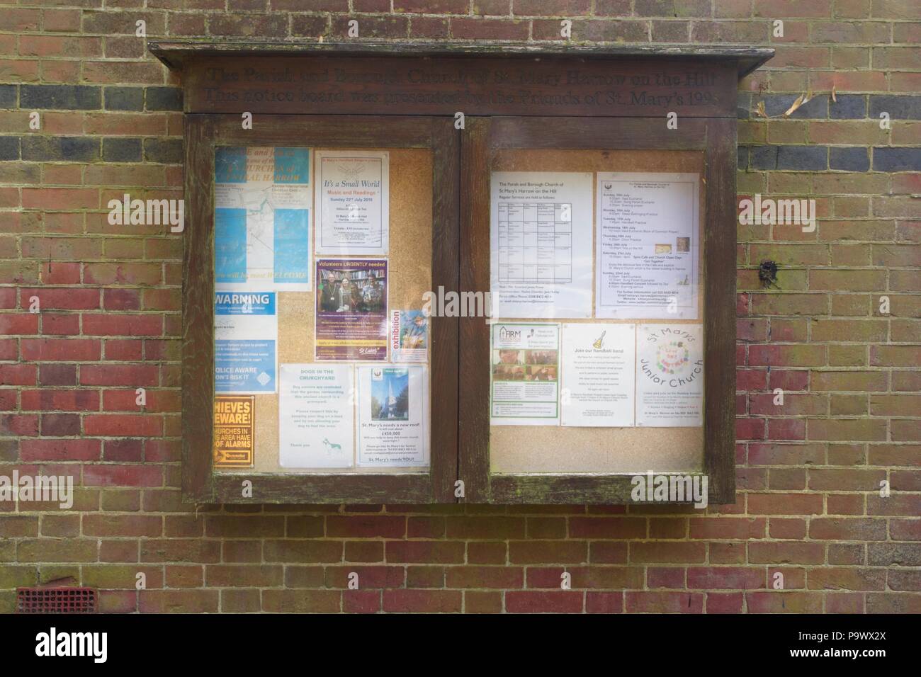 Notices on brick wall hi-res stock photography and images - Alamy