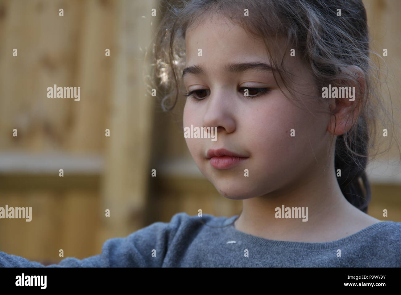 Pretty attractive caucasian white girl standing outside modern college ...