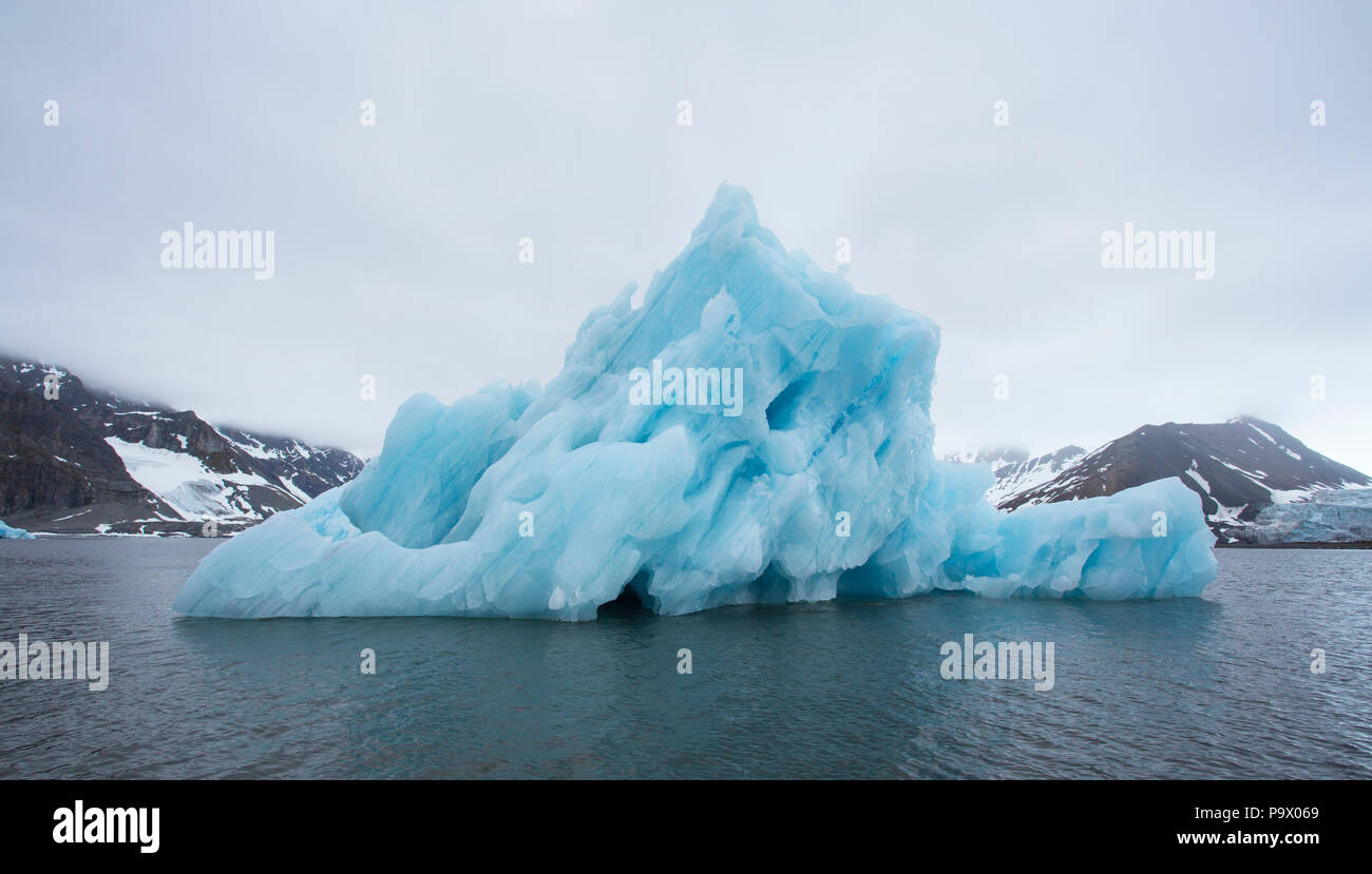 Blue iceberg, Svalbard Stock Photo - Alamy