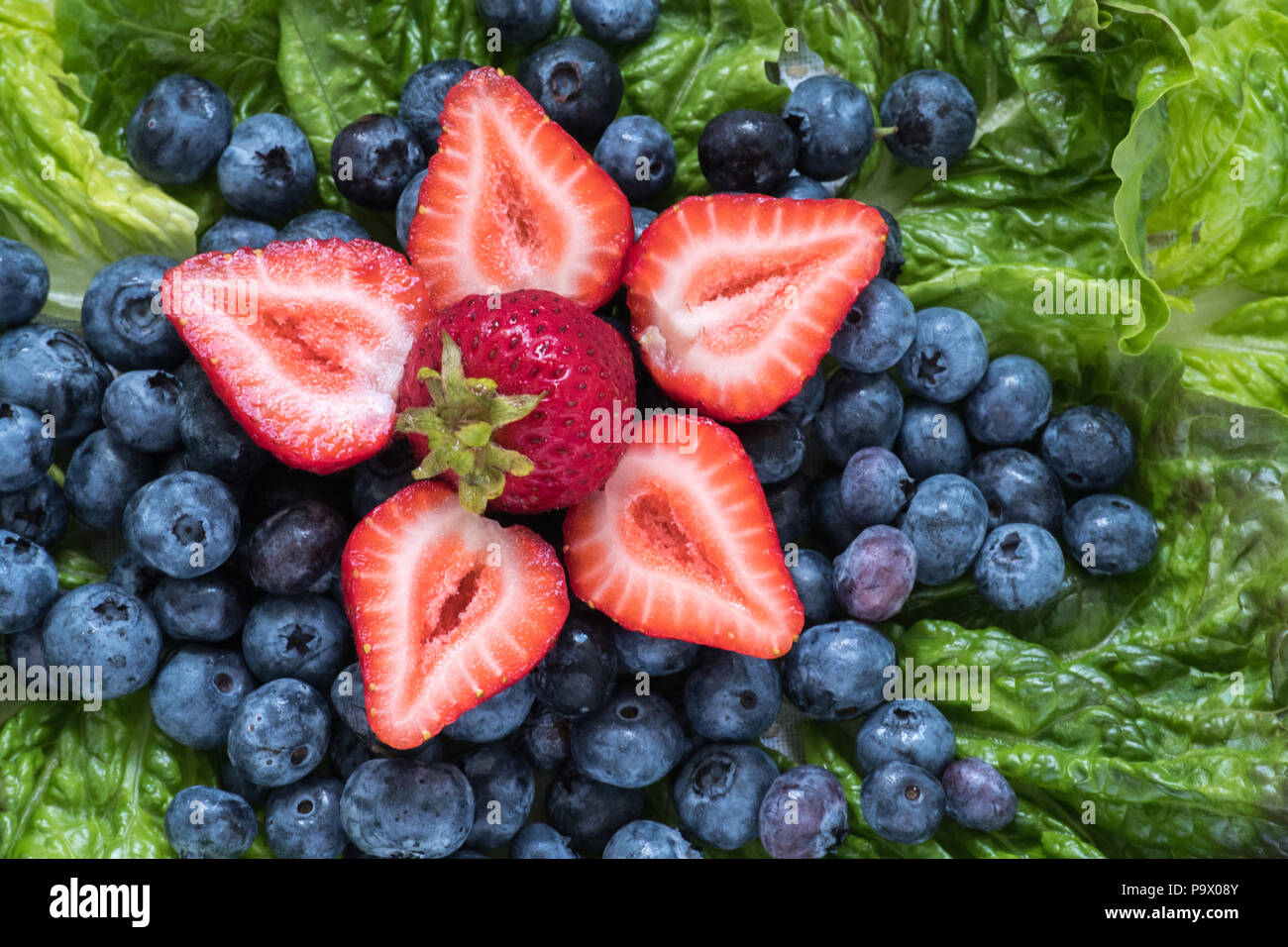 Heart healthy fruit - blueberries, strawberries in a beautiful design ...