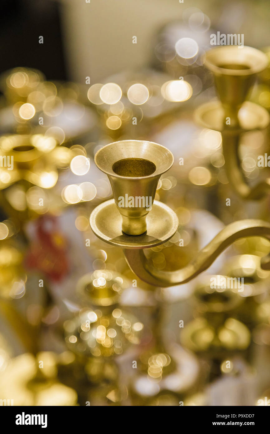 Golden candlestick closeup, the background is blurred Stock Photo - Alamy