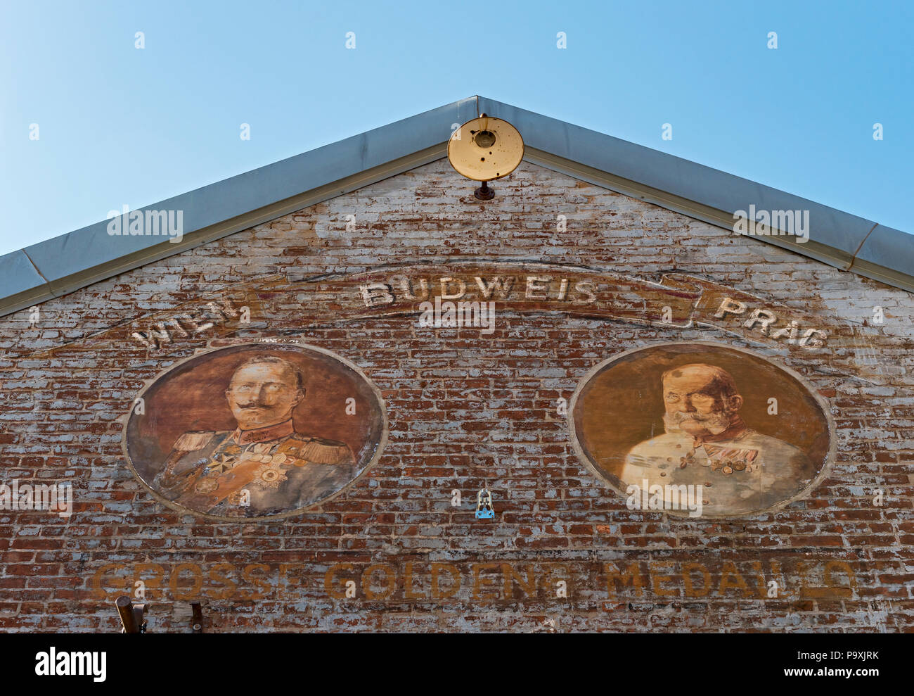 Signs on red-brick warehouse wall of Radegast Hall and Biergarten in ...