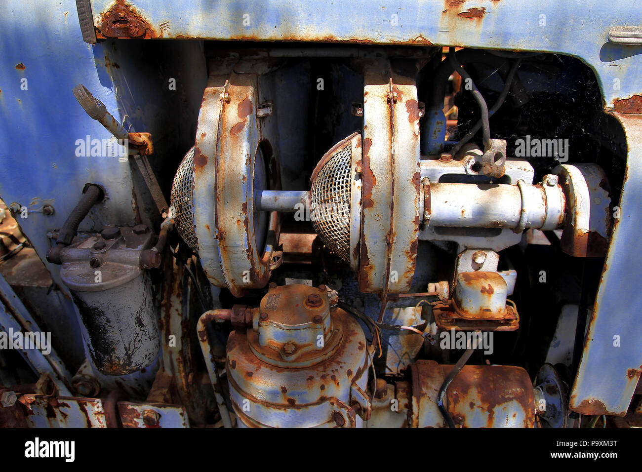 The mechanism of an old tractor on waste, close-up Stock Photo - Alamy