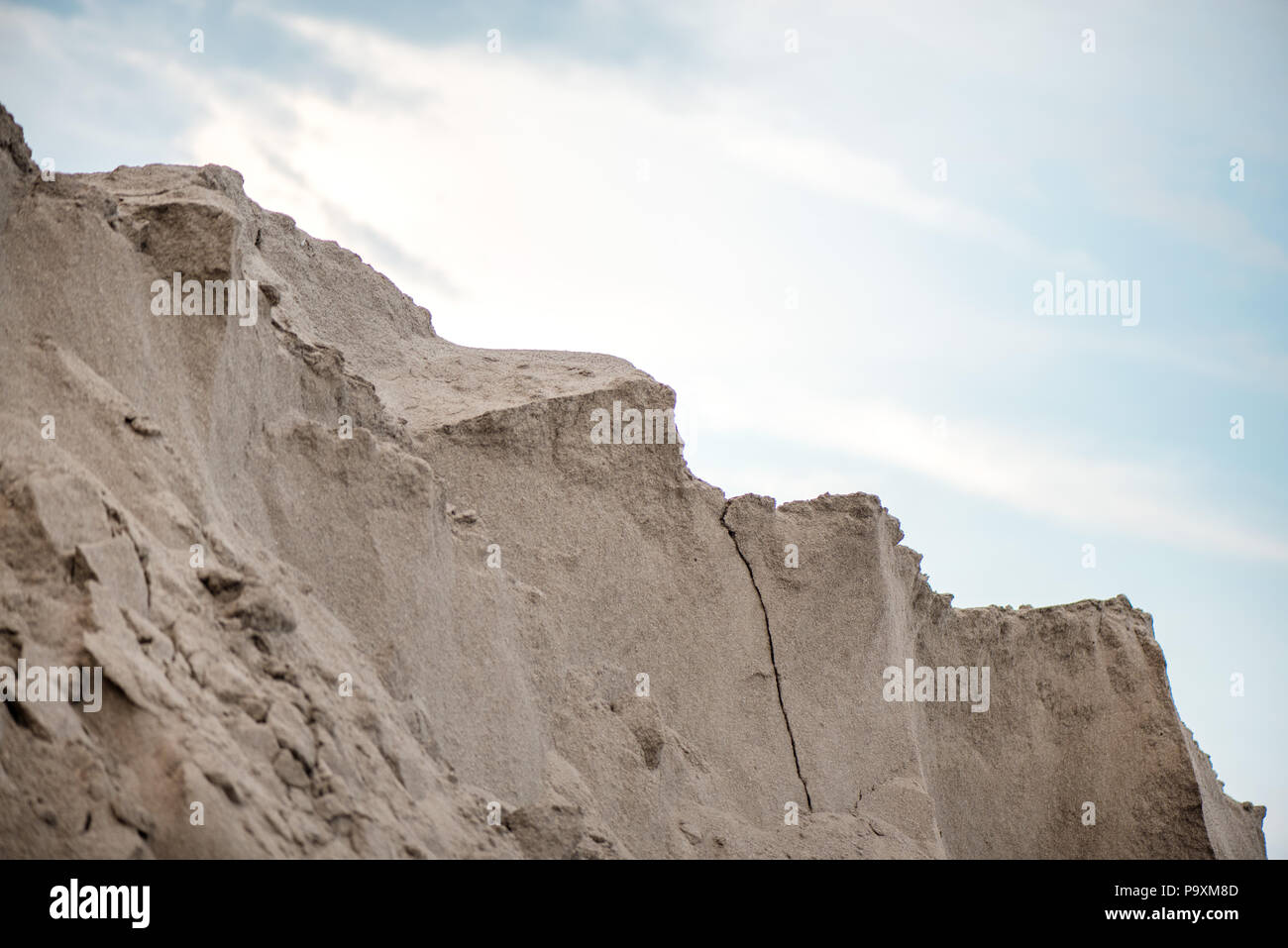 Large piles of construction sand and gravel used for asphalt production ...