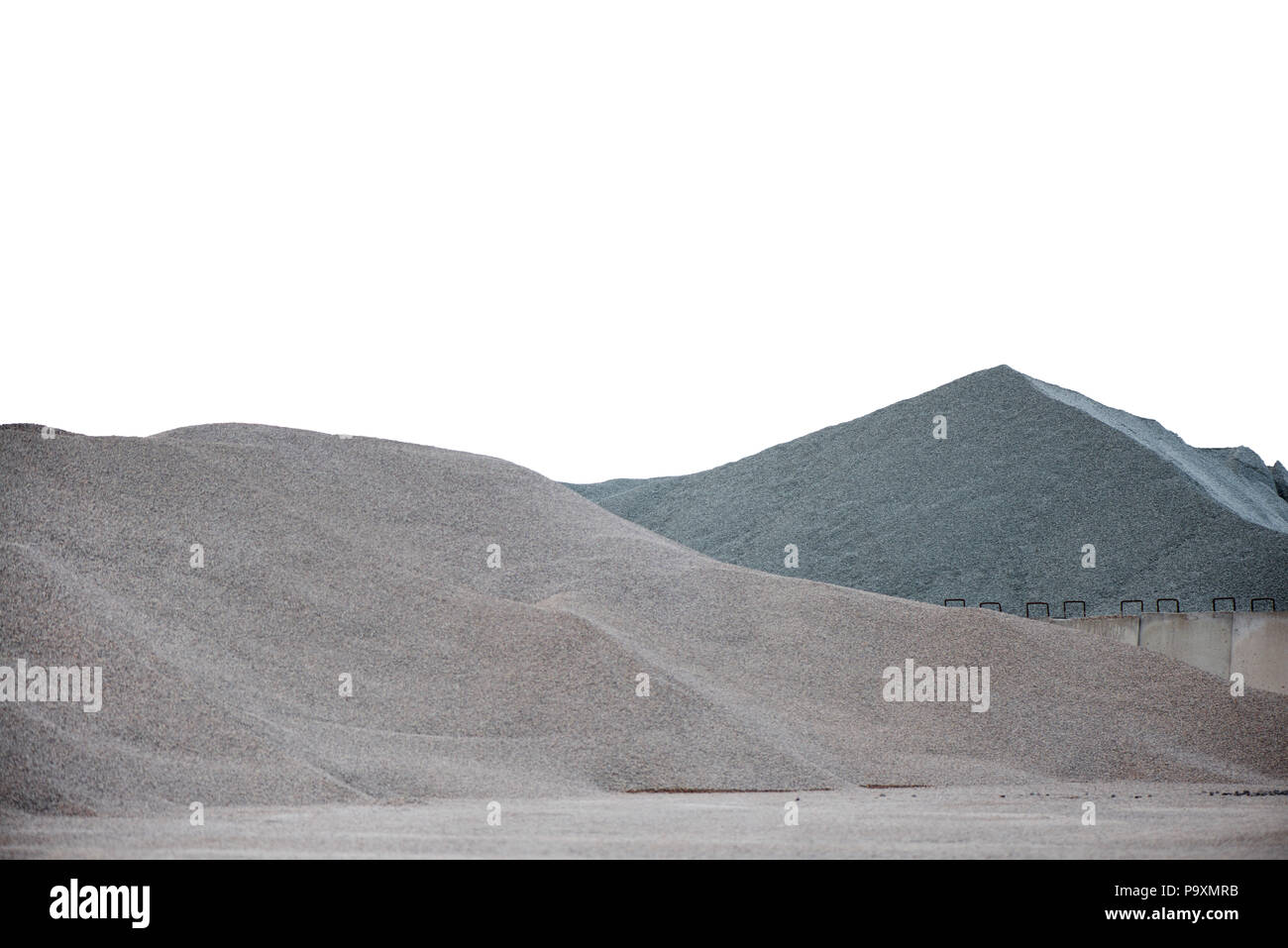 Large piles of construction sand and gravel used for asphalt production ...