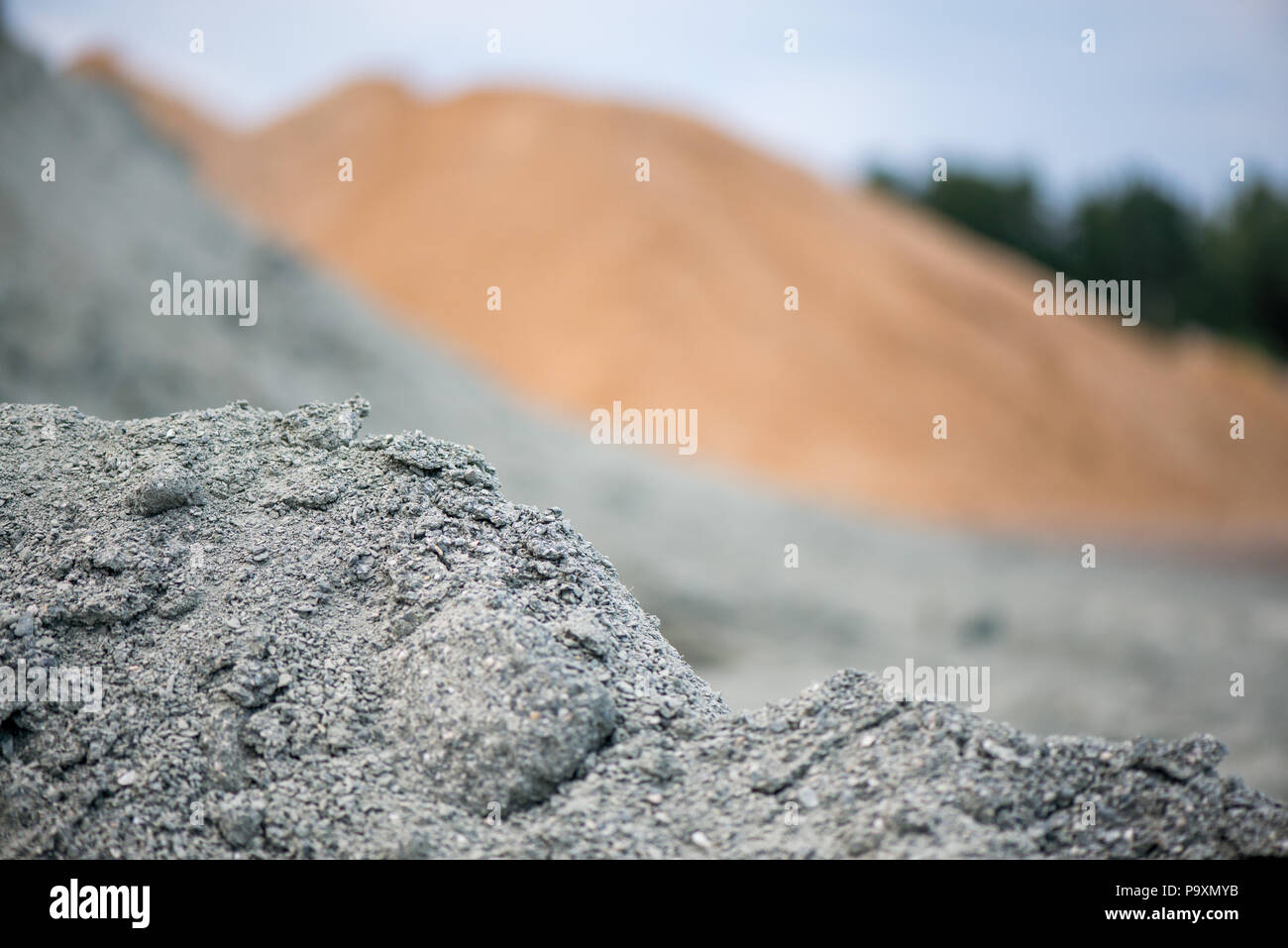 Large piles of construction sand and gravel used for asphalt production ...