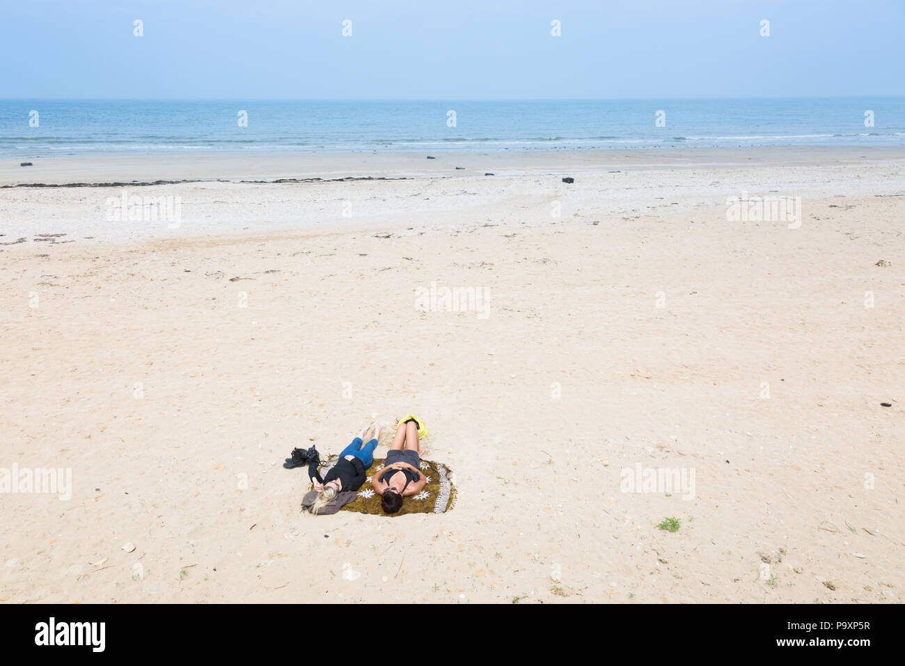 Sunbathers france beach hi-res stock photography and images - Alamy