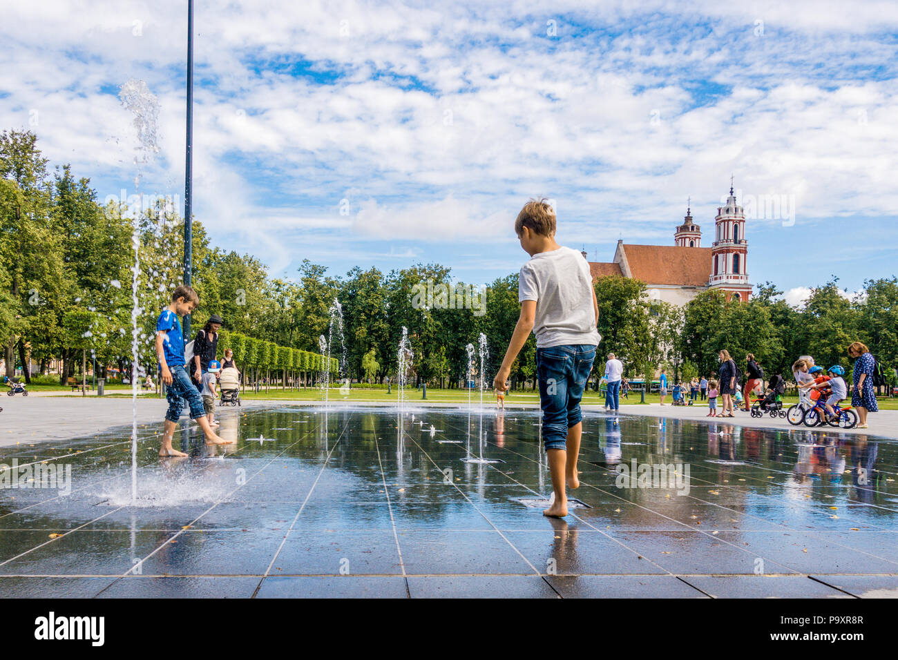 Vilnius Lithuania, July 06 2018: Happy kids have fun playing in city ...