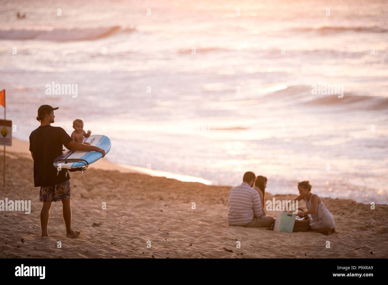 Women on beach baby hi-res stock photography and images - Alamy
