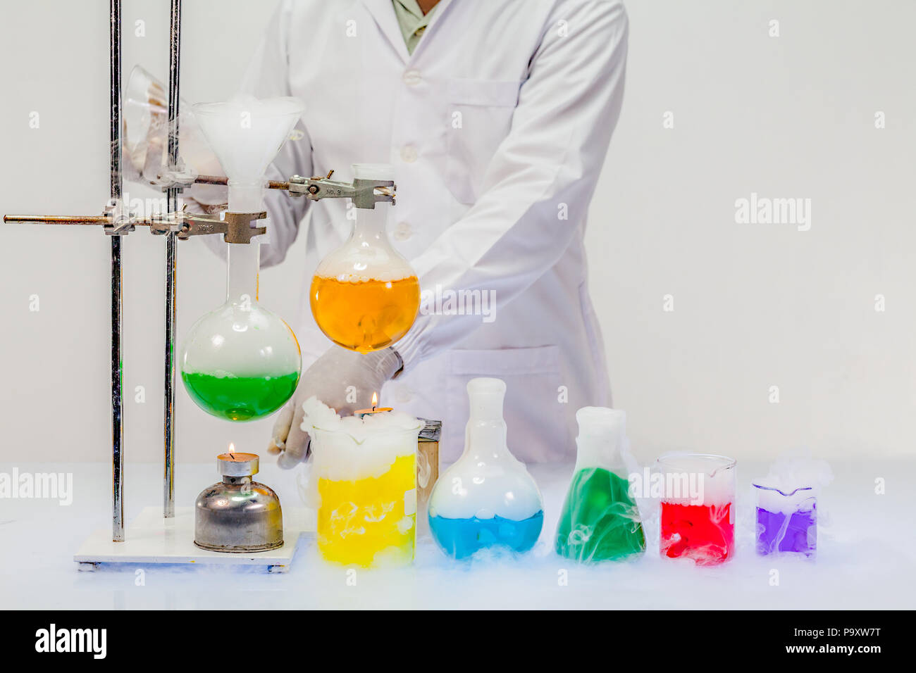 a scientist testing in laboratory experiments in chemical blending ...
