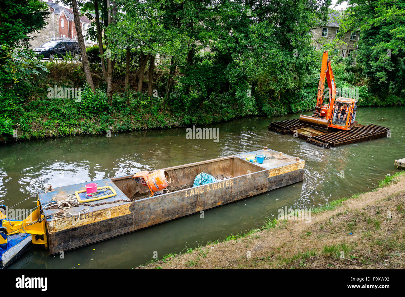 Large floating crane dredging river taken in Frome, Somerset, UK on 19 ...