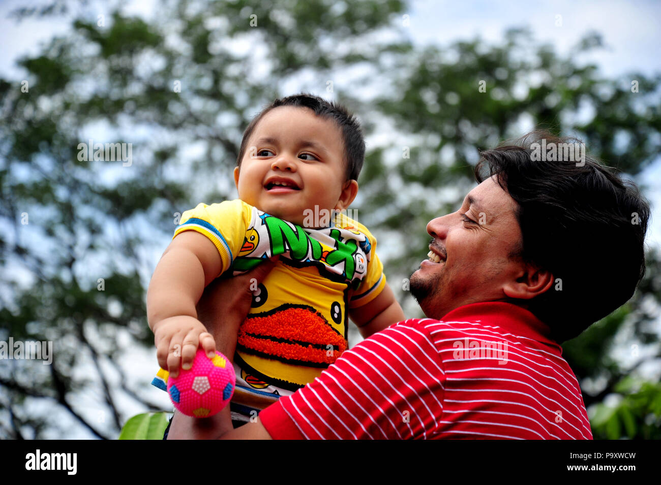 Father and child in Bangladesh Stock Photo - Alamy