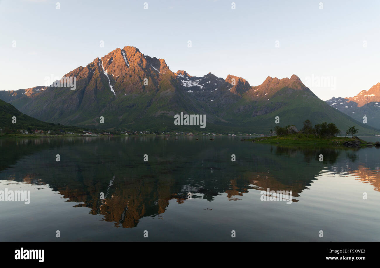 Alpen glow on mountains near Laupstad, Lofoten Islands, Norway Stock ...