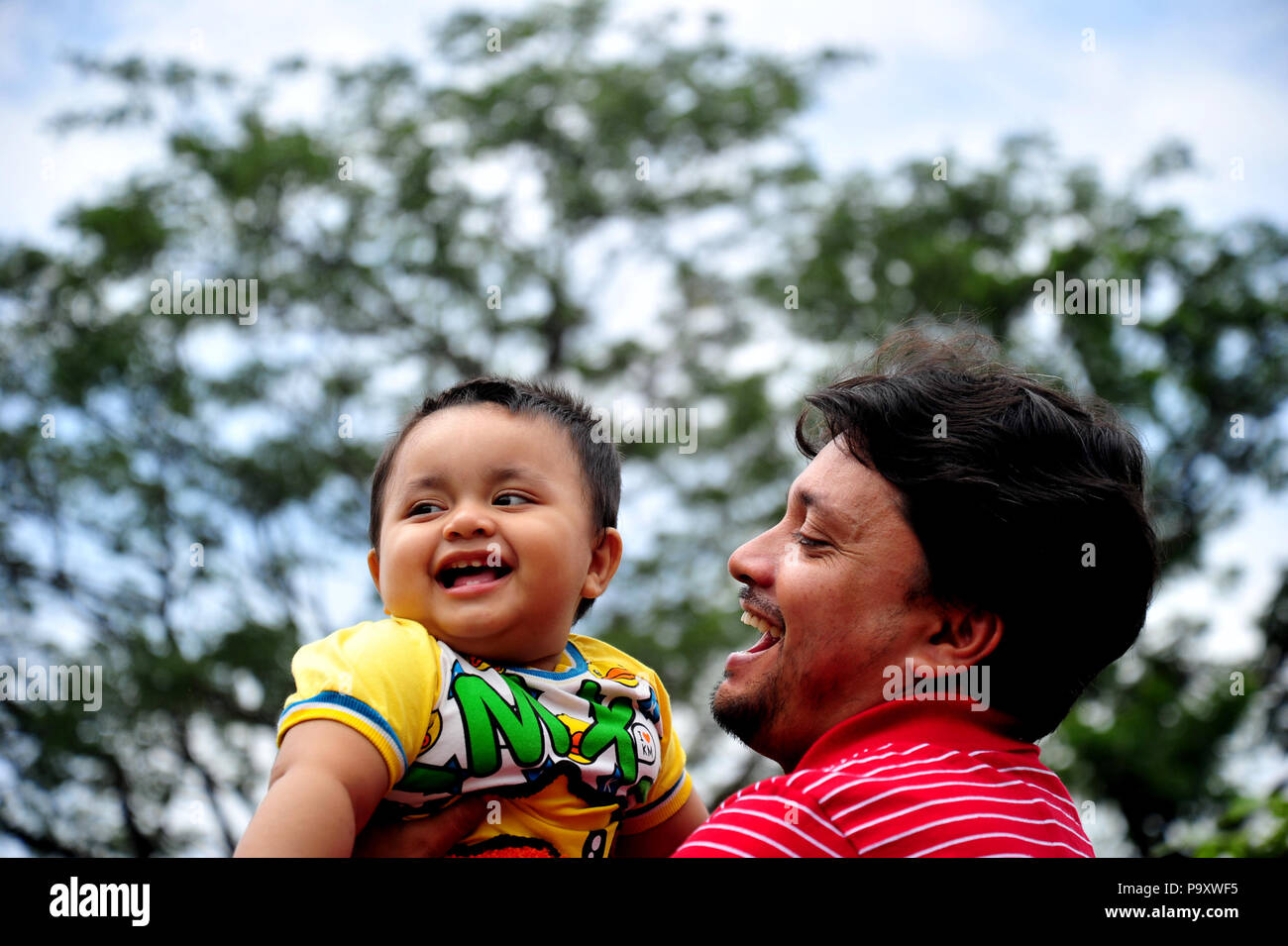 Father and child in Bangladesh Stock Photo - Alamy