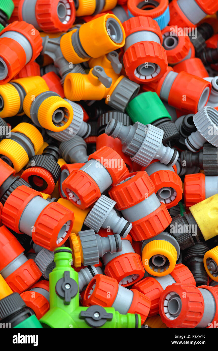 Colorful plastic hose fittings and adapters Stock Photo - Alamy