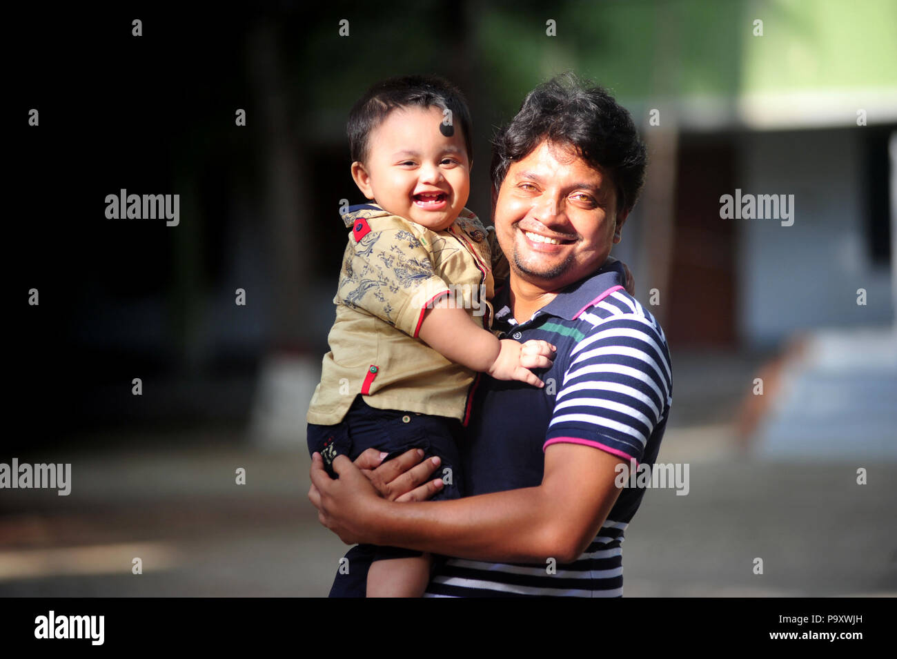 Father and child in Bangladesh Stock Photo - Alamy