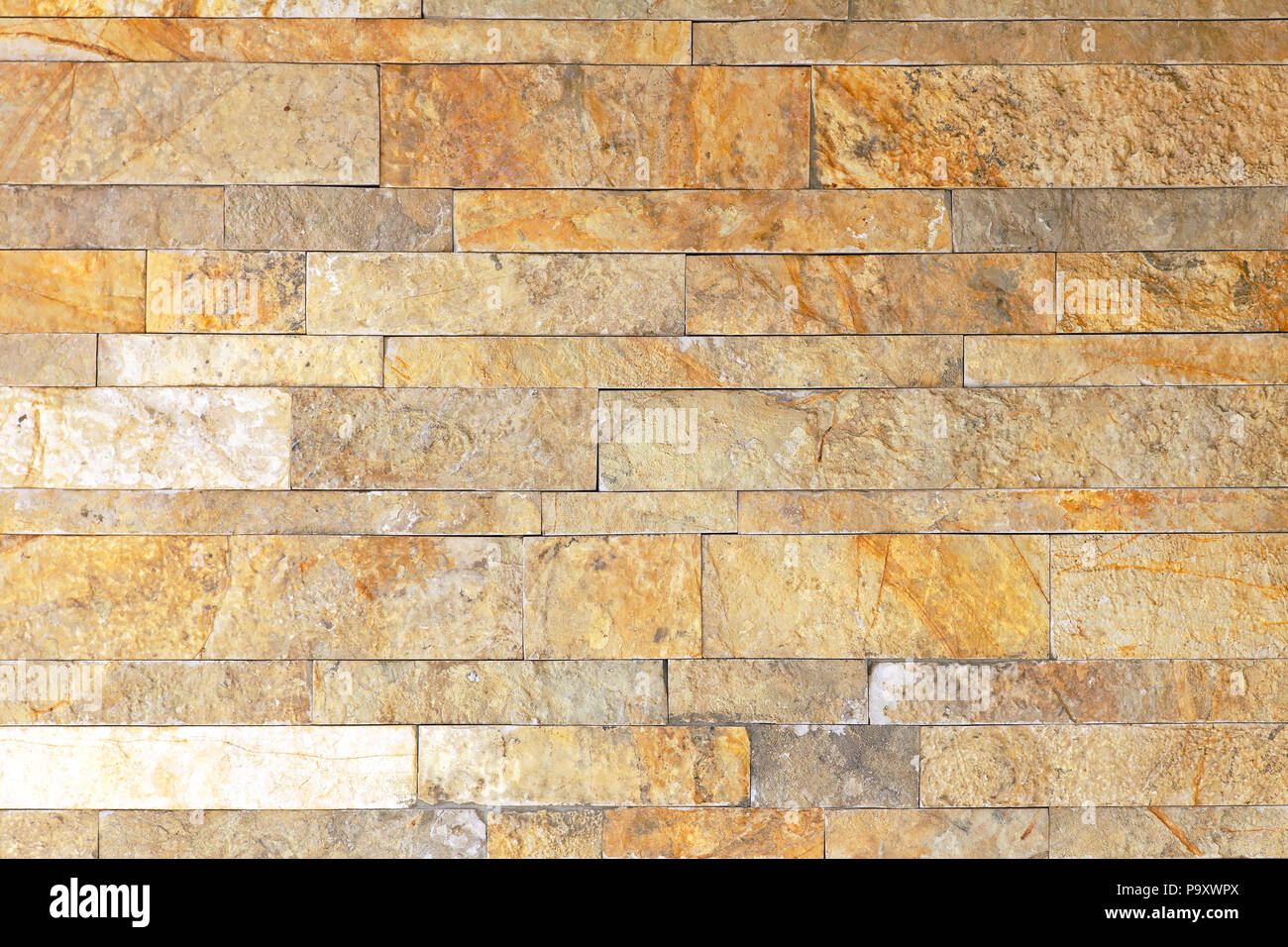 Italian rough stone tiles wall Stock Photo - Alamy