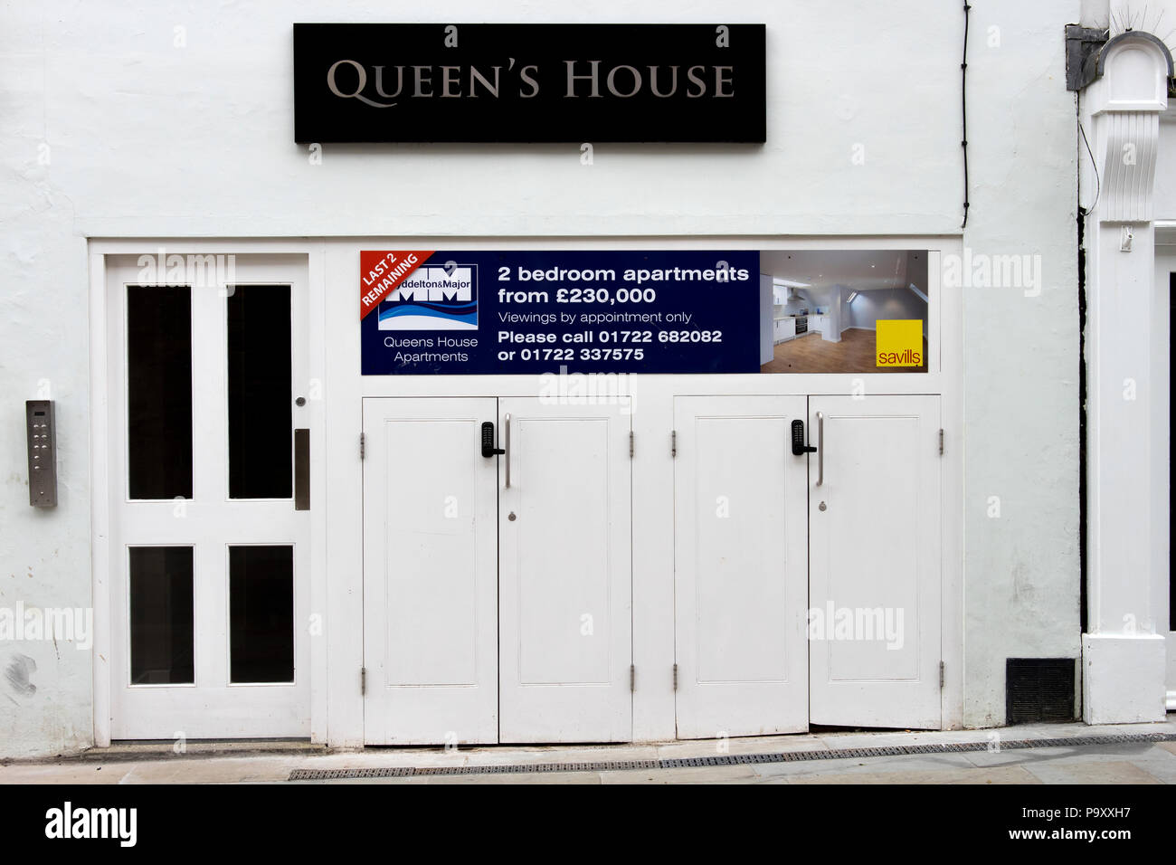 Queen House premises with estate agent board advertising residential ...