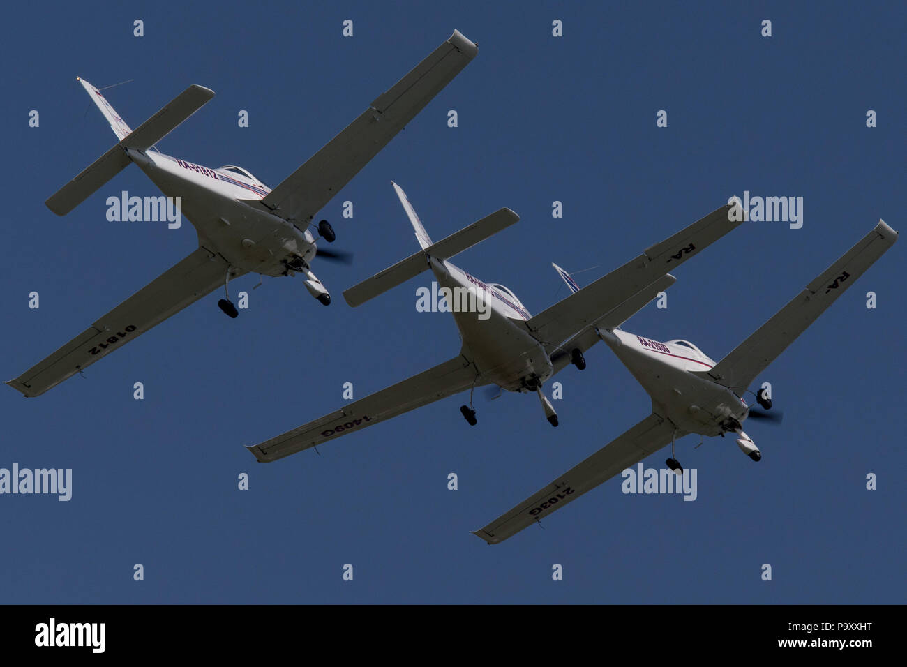 A group of Tecnam P2002 light airplanes perform its demonstration ...