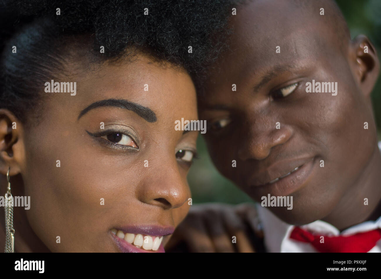 Heads together stuck hi-res stock photography and images - Alamy