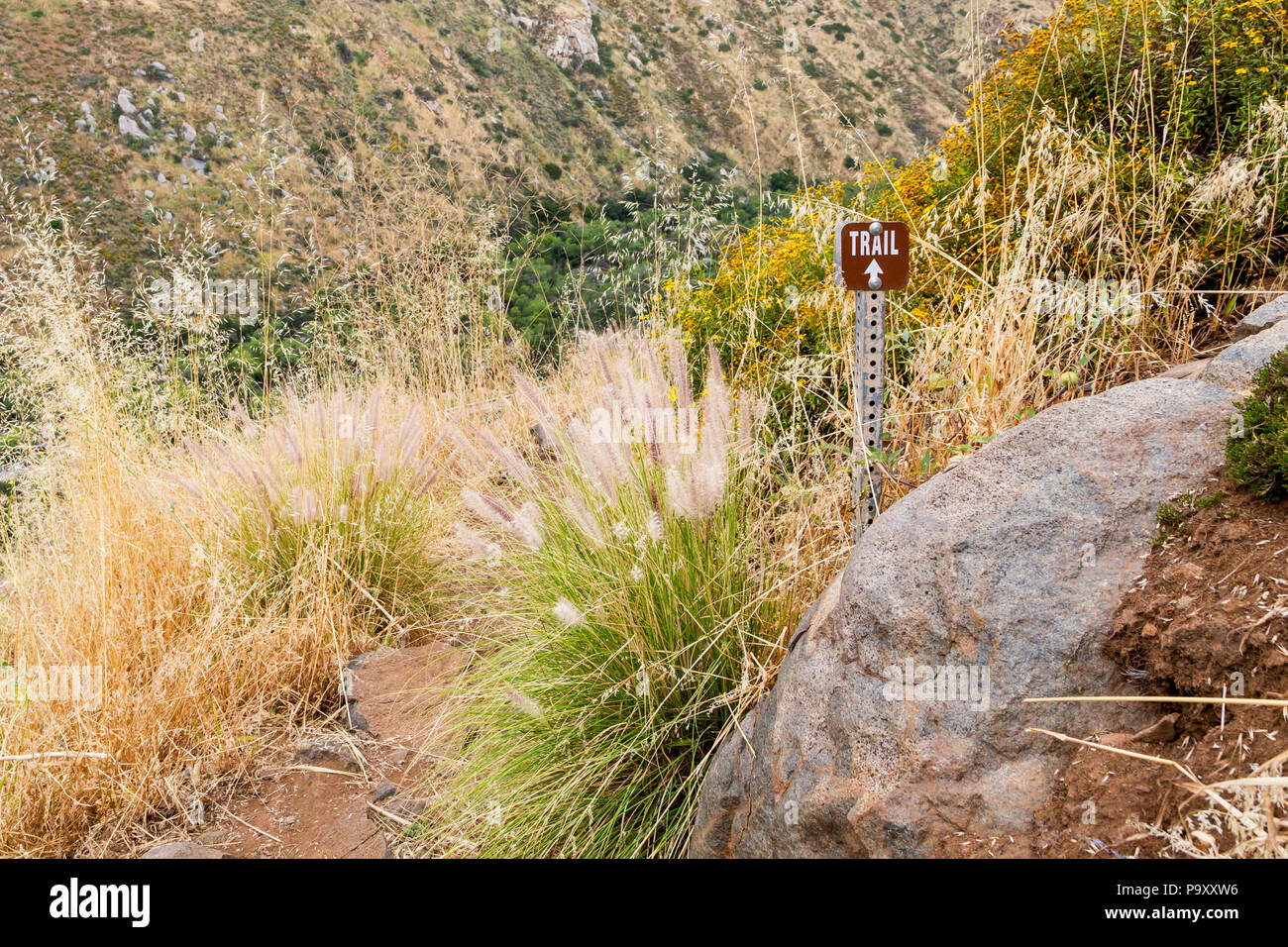 Metal trailhead sign Stock Photo - Alamy