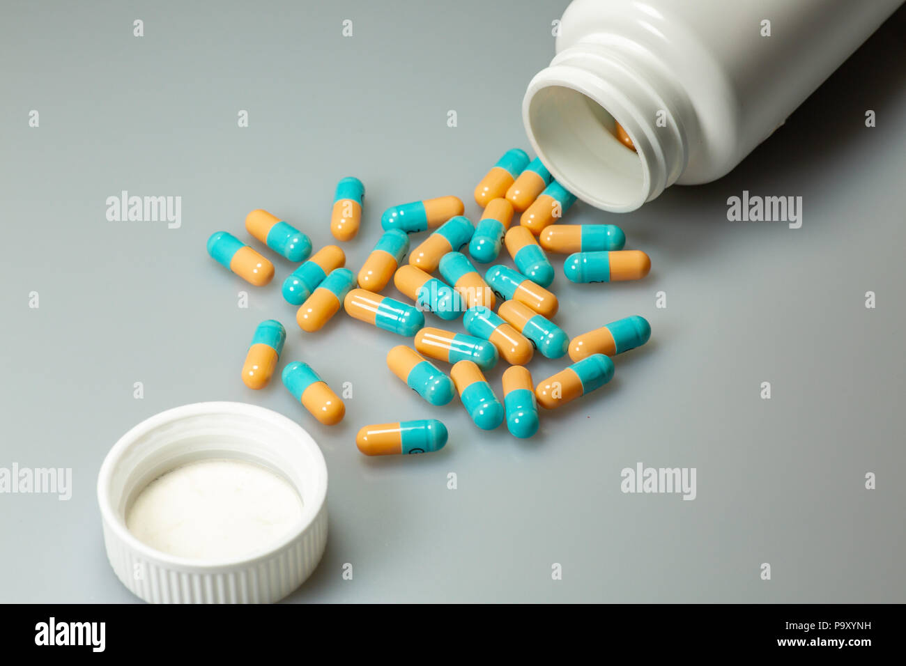 Pills falling out pill bottle hi-res stock photography and images - Alamy