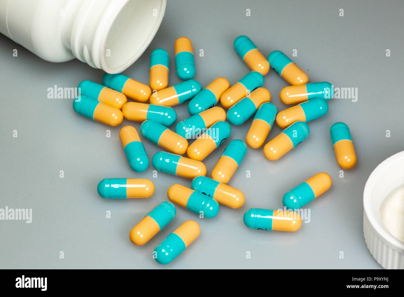 Pills falling out pill bottle hi-res stock photography and images - Alamy