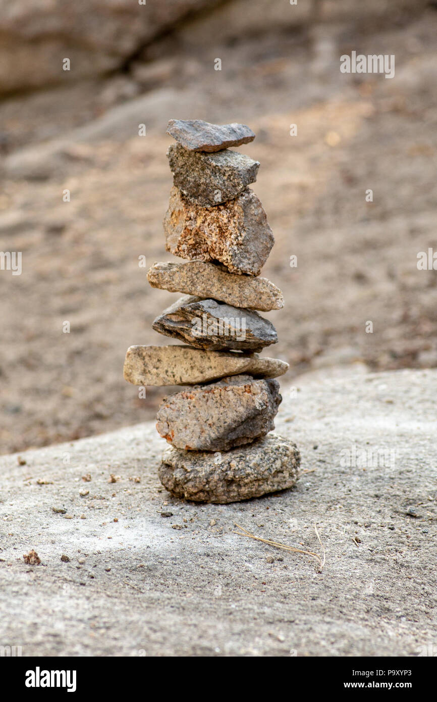 A series of stacked rock on top of a boulder at the campground Stock ...