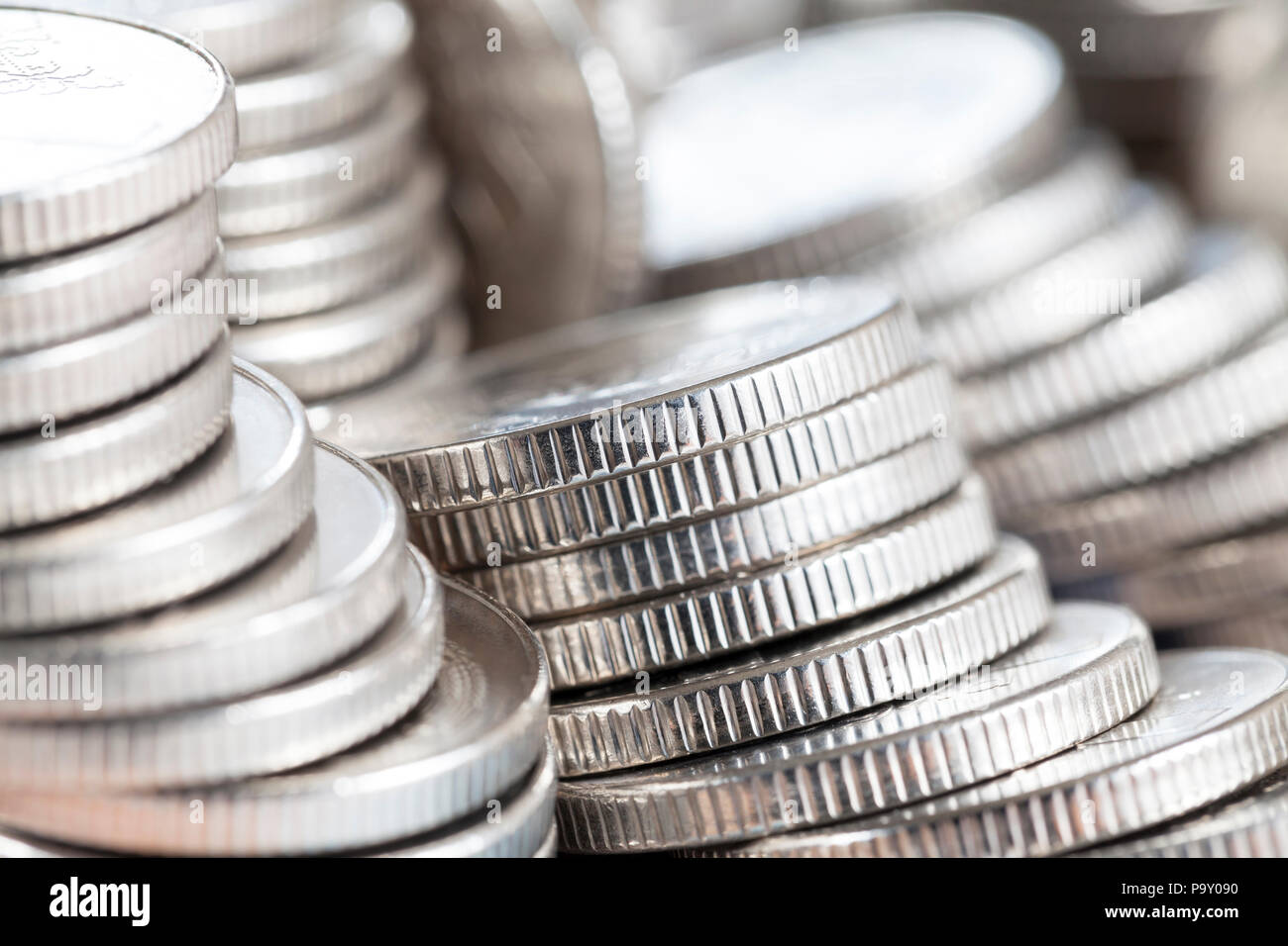 Silver coins stacked hi-res stock photography and images - Alamy