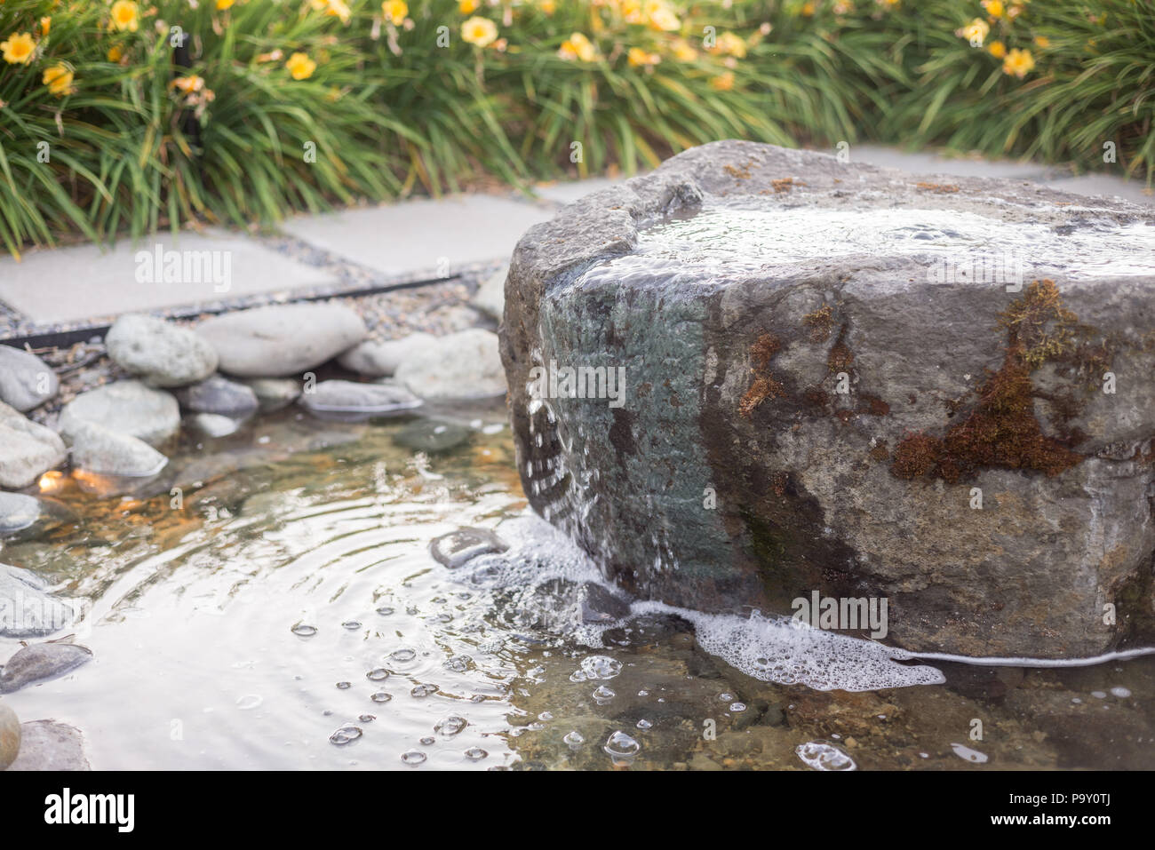 Detail of a custom stone fountain Stock Photo - Alamy