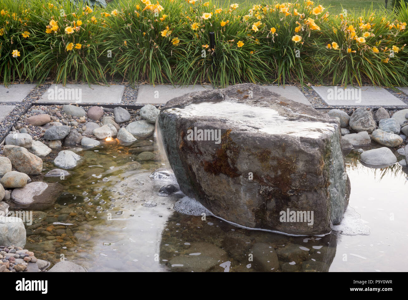 Detail of a custom stone fountain Stock Photo - Alamy